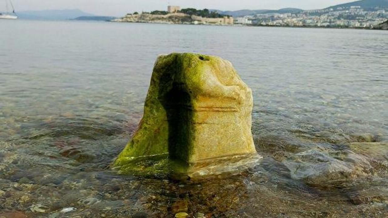 Deniz suyu çekildi; Roma dönemine ait mermer kaide ortaya çıktı - Haber ...